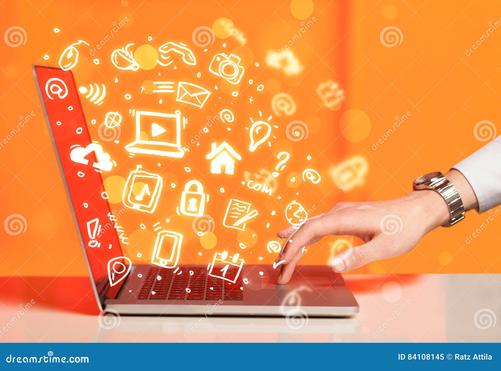 Hand Writing on Notebook Computer with Media Icons and Symbols Stock ...