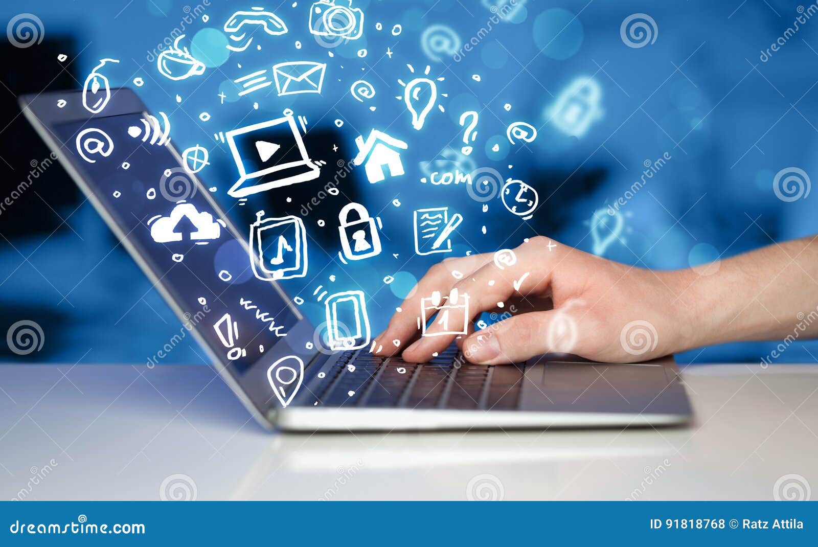 Hand Writing on Notebook Computer with Media Icons and Symbols Stock ...