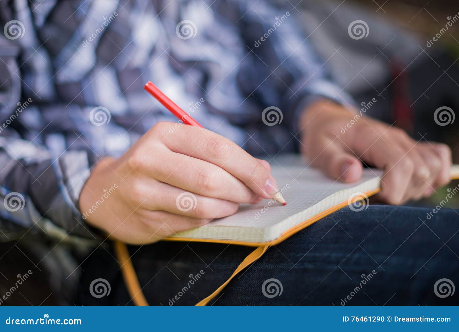 Hand writing in notebook. stock photo. Image of jeans - 76461290