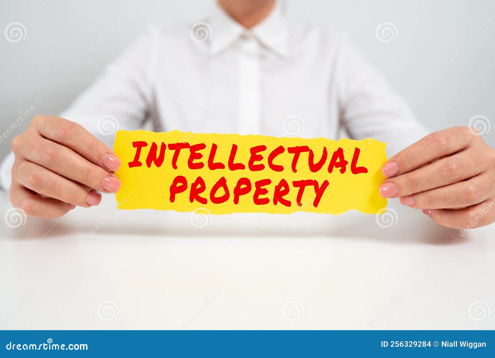 Hand Writing Sign Intellectual Property. Concept Meaning Protect from ...