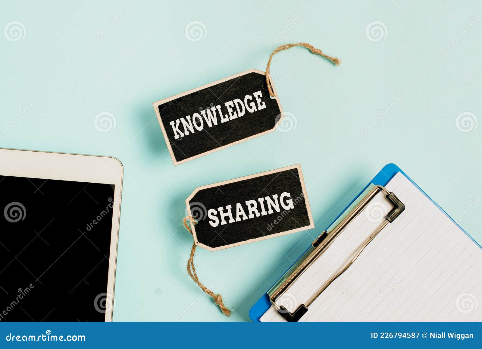 Hand Writing Sign Knowledge Sharing. Word for Deliberate Exchange of Information that Helps with ...