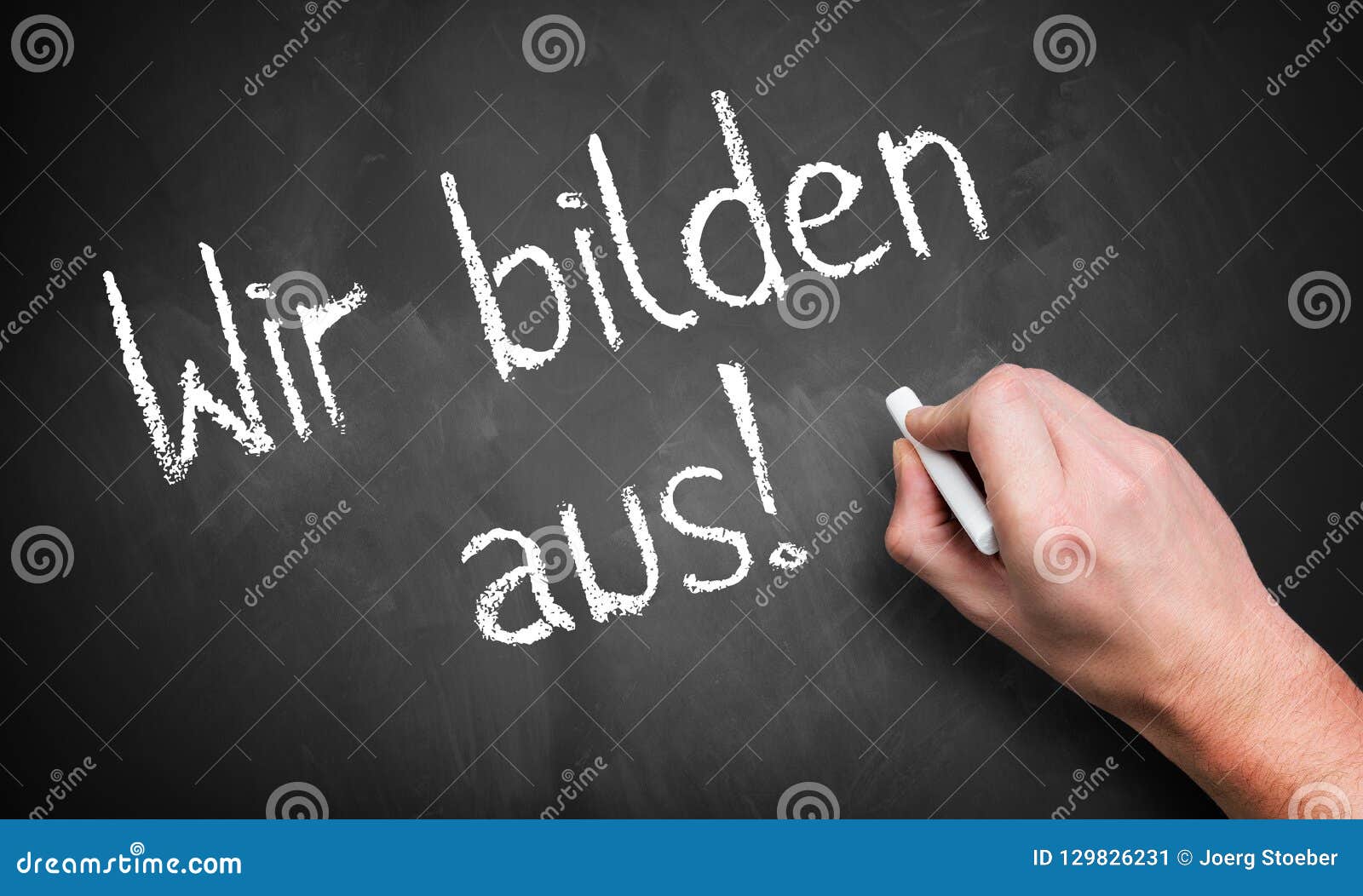 Hand Writing `we Train People!` in German Stock Image - Image of ...