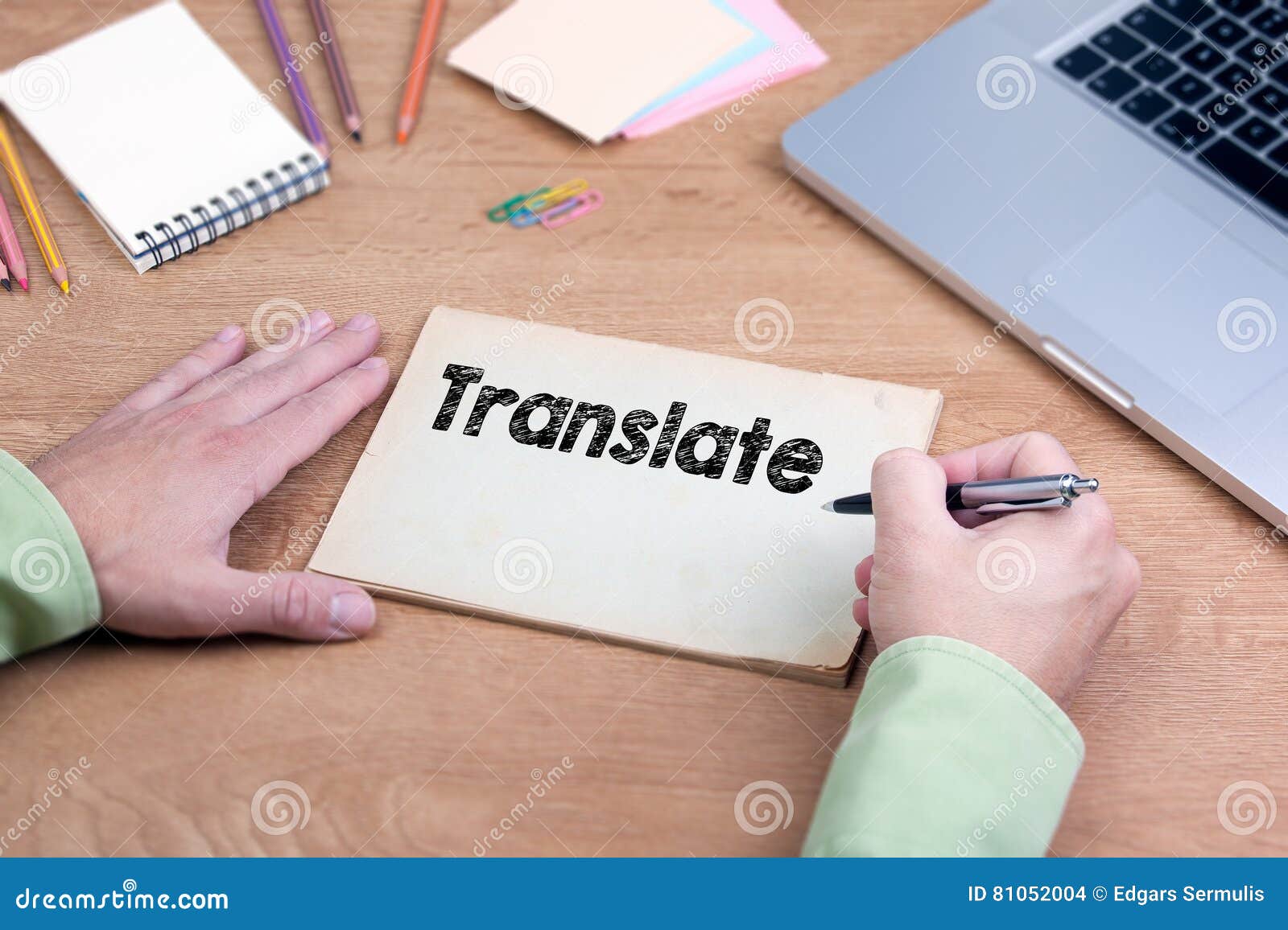 Hand Writing Translate. Office Desk with a Laptop and Stationery Stock ...