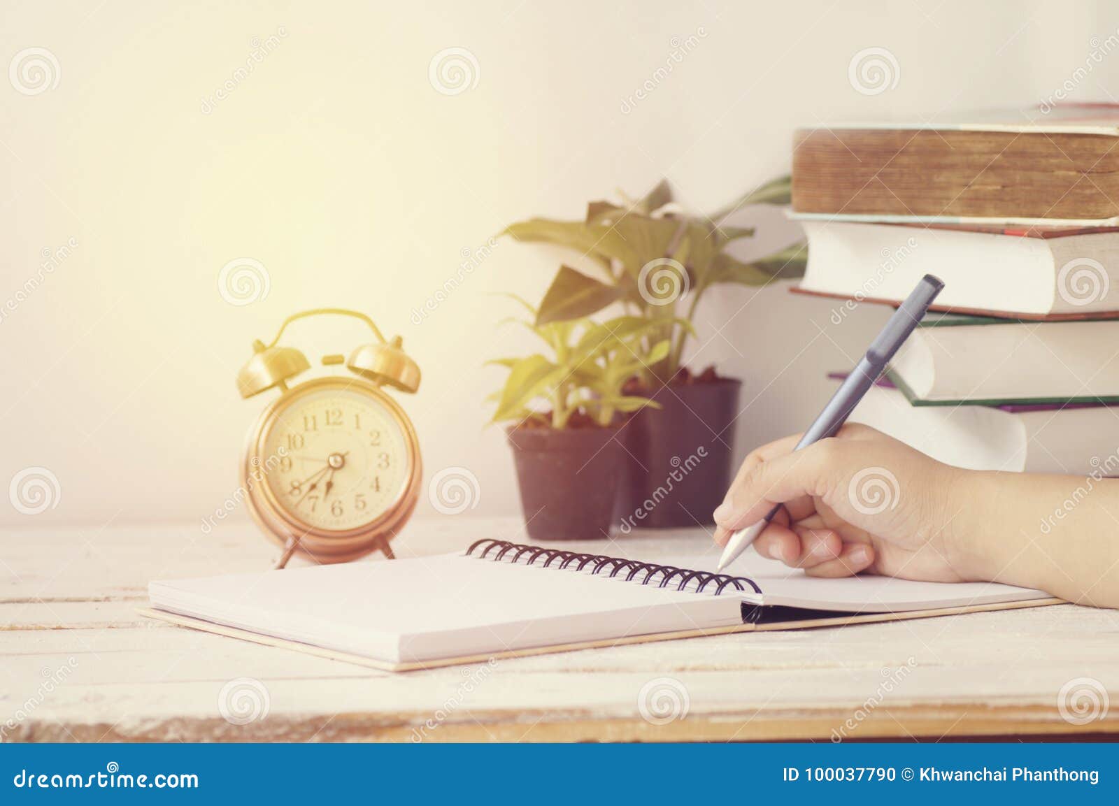 Hand writing on table stock photo. Image of notepad - 100037790