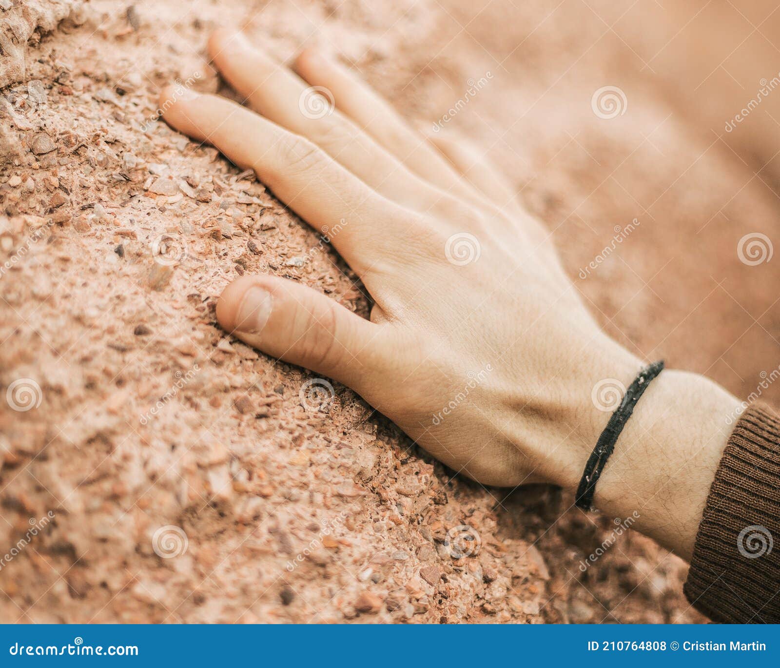 A Hand of a Young Boy Touching the Sand Stock Photo - Image of filter ...