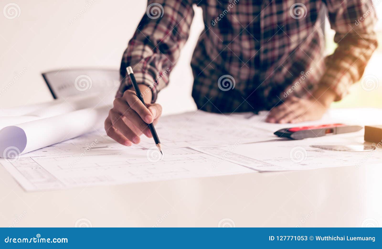 Hand of Young Engineering Man Drawing on Blueprint. Stock Image - Image ...