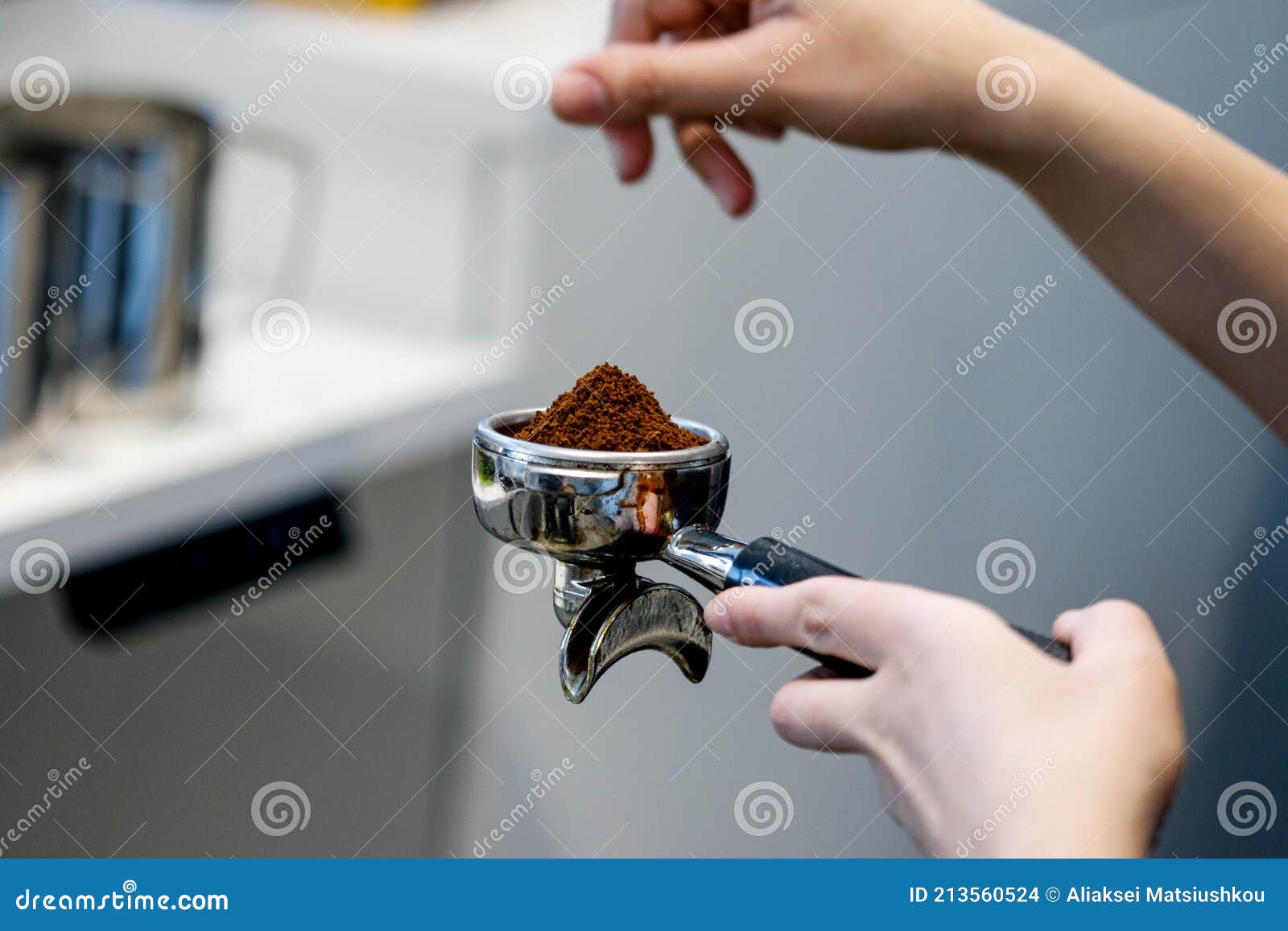 The Hand of a Young Man is Operating a Professional Coffee Machine ...
