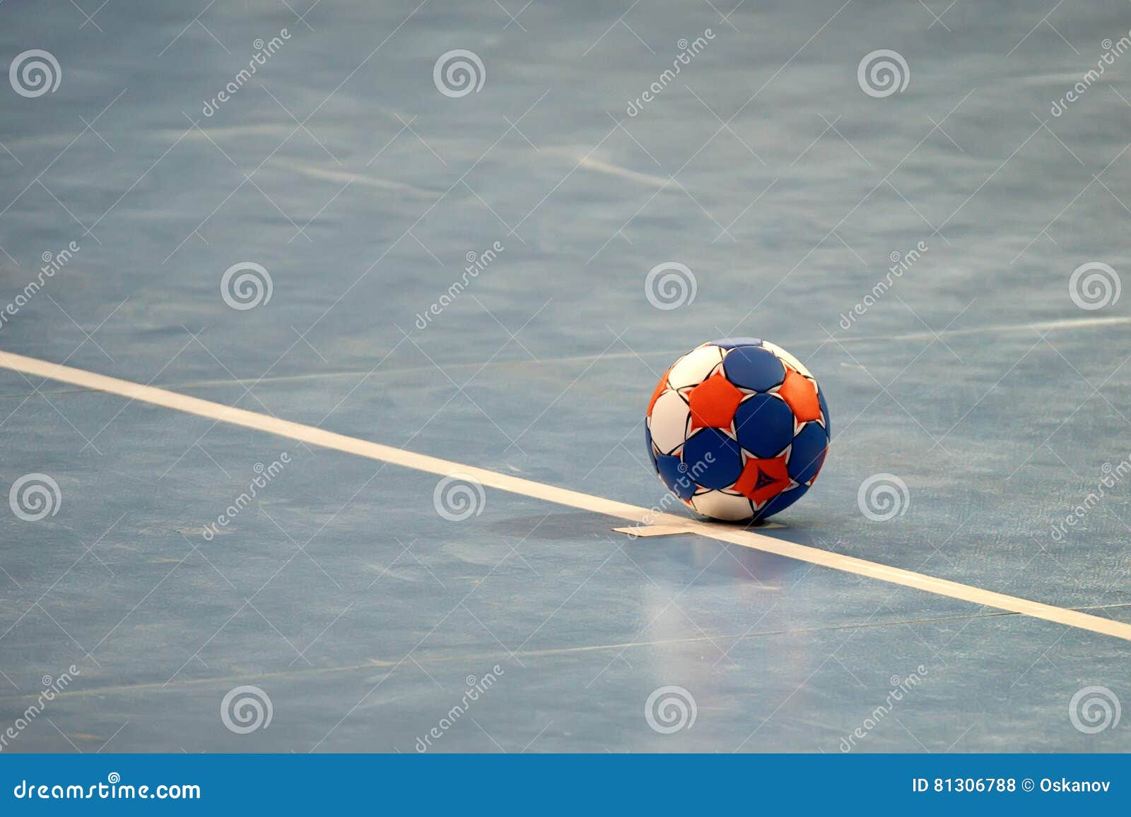 Handball ball on field stock photo. Image of blue, hand - 81306788
