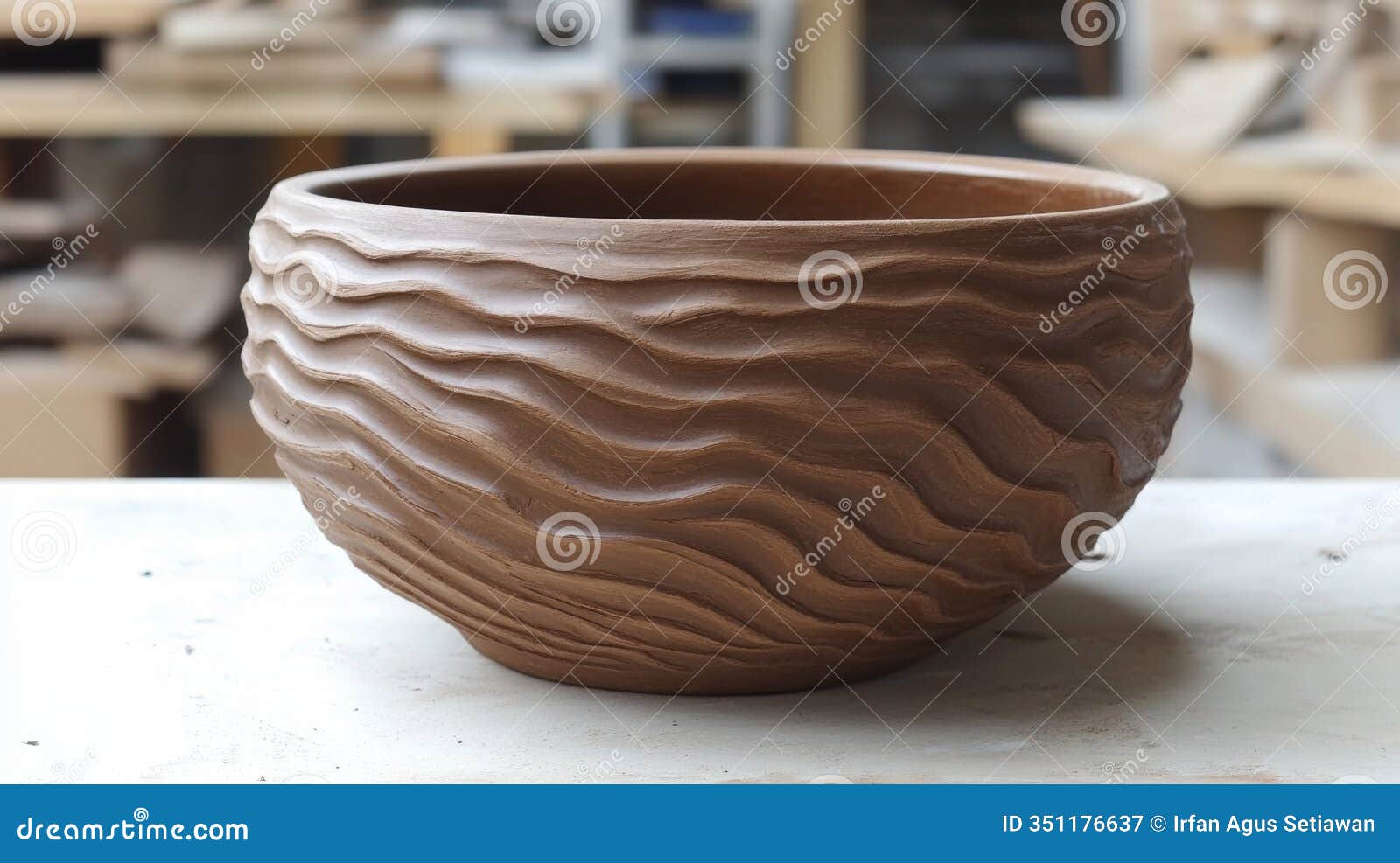 Handcrafted Clay Bowl With Wave Pattern Design Royalty-Free Stock Photo ...