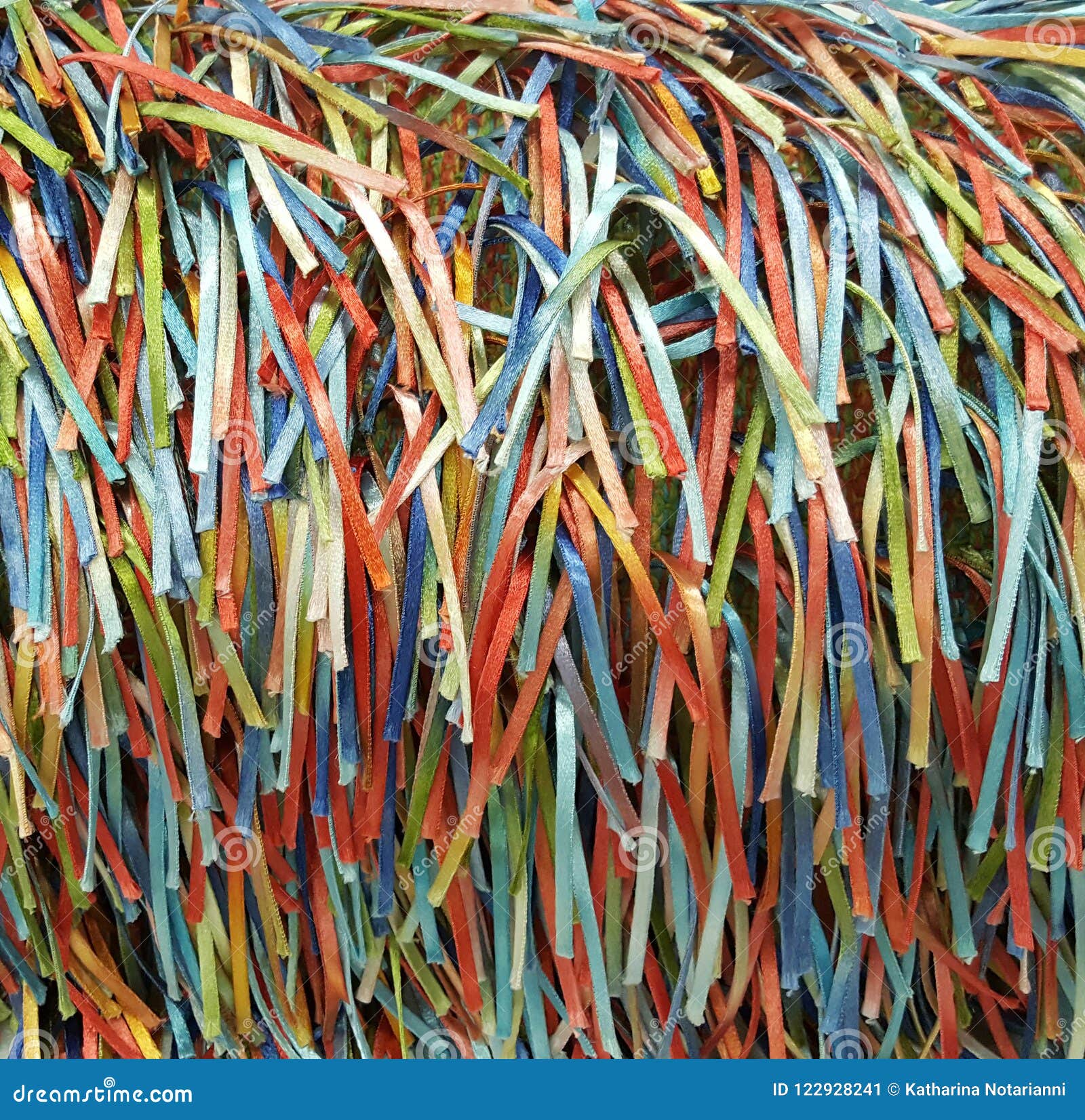 A Rainbow of Colorful Strands of Ribbons and Threads Stock Image ...