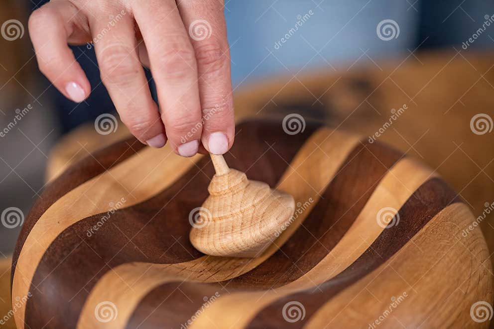 Handcrafted Wooden Spinner stock image. Image of artisanal - 313381403