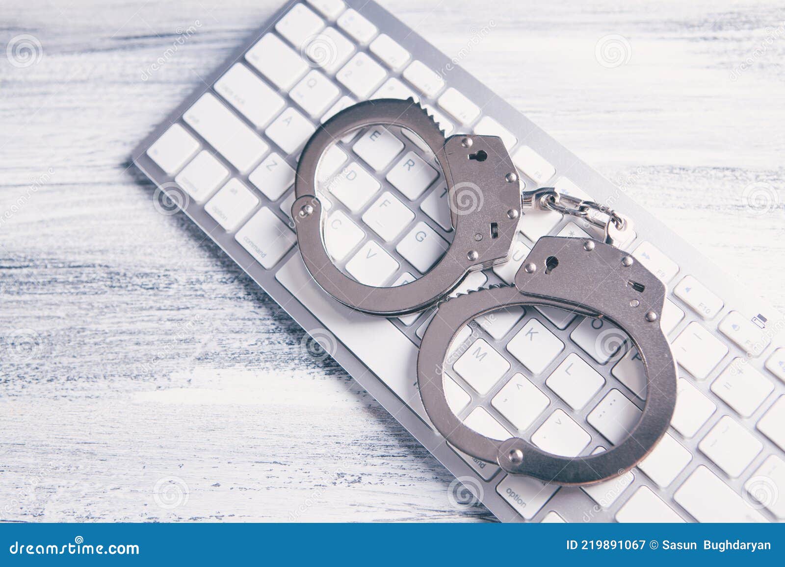 Handcuff with Laptop on the Table Stock Image - Image of restriction ...