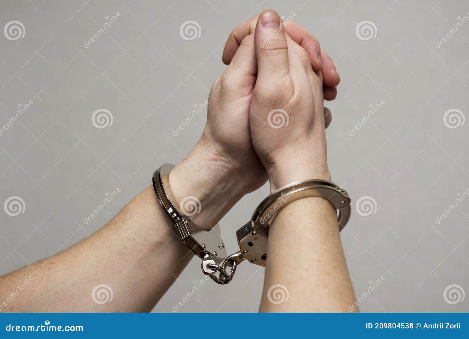 Handcuff on Mans Arms, Praying for Forgiveness. Chained Hands Praying ...