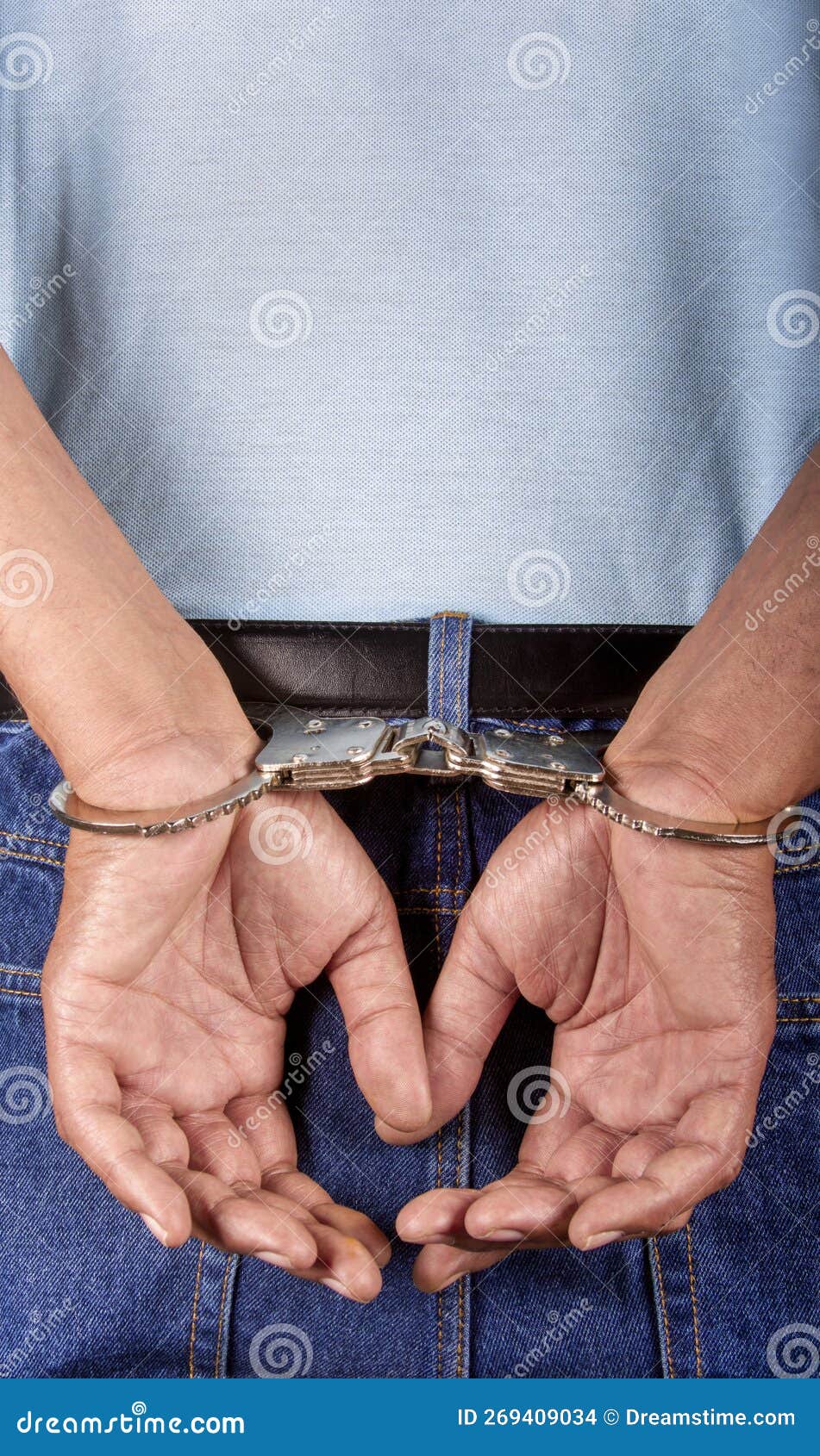 Handcuffed at the Back Hands of Hispanic Man Stock Photo - Image of ...