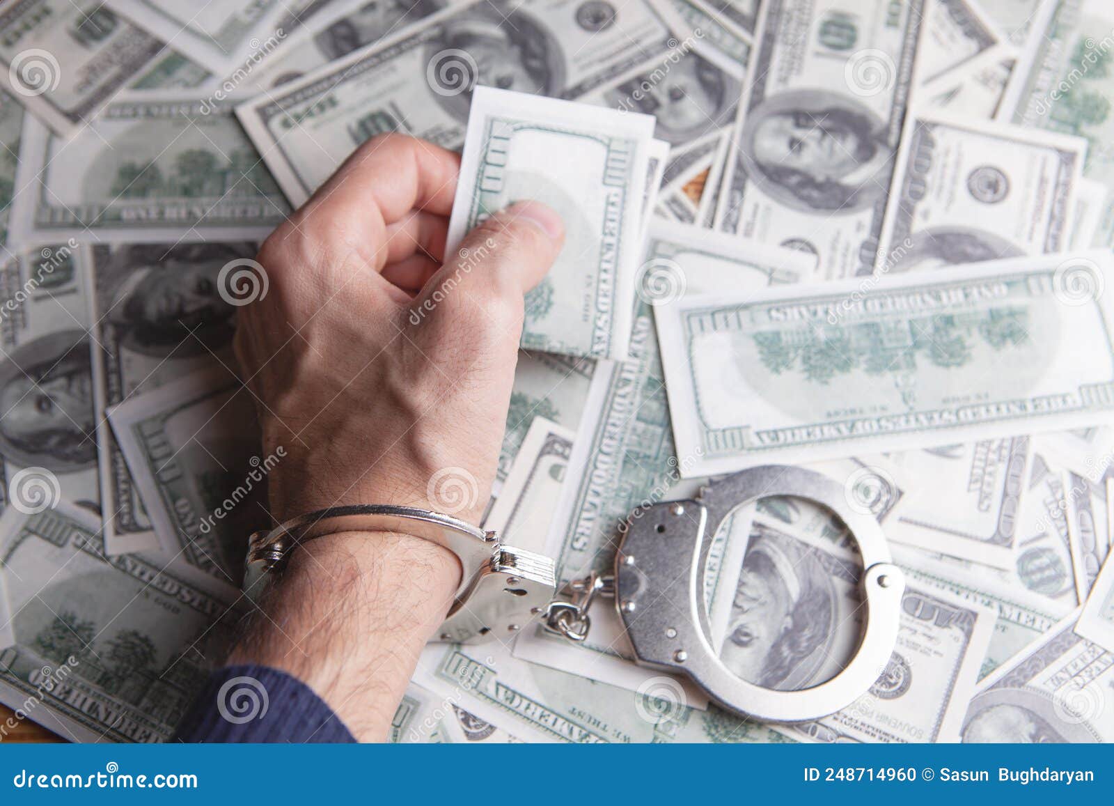 Handcuffed at the Table with Money Stock Photo - Image of hand ...