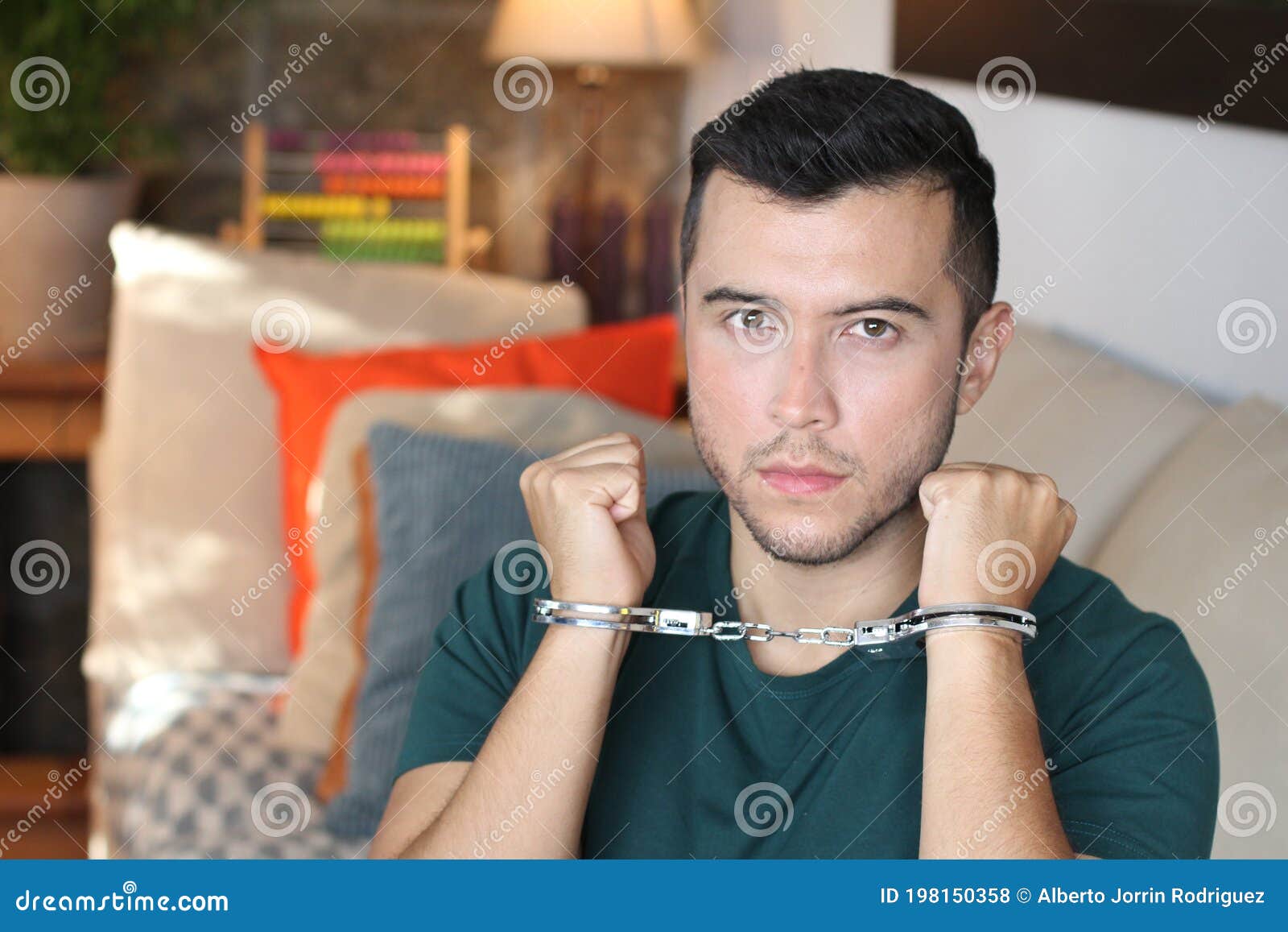 Handcuffed Young Man In The Sofa Royalty-Free Stock Photo ...