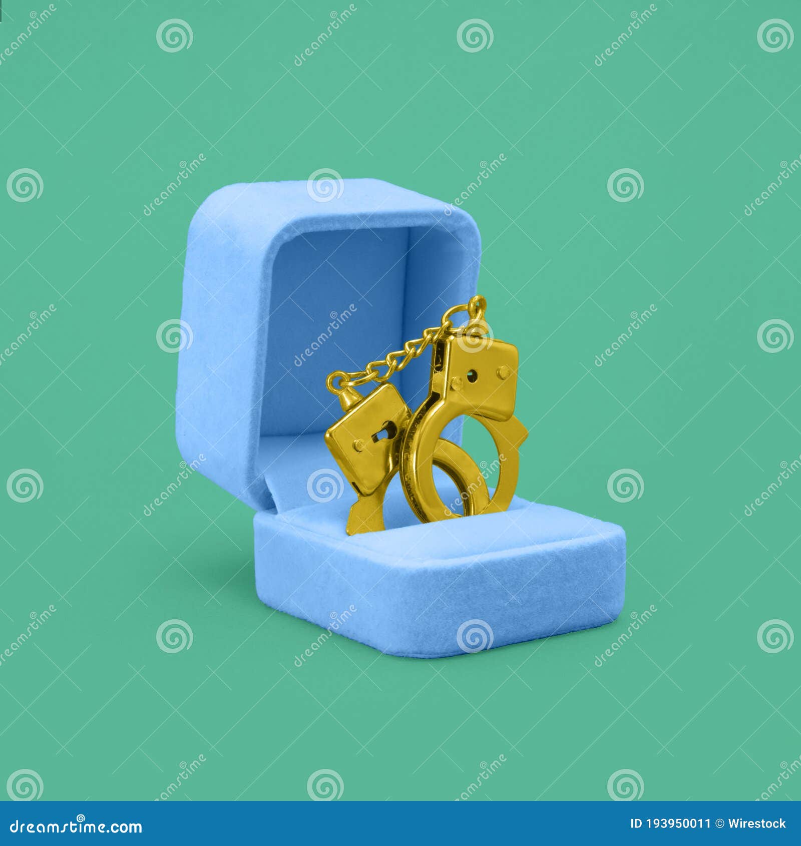 Handcuffs in a Blue Ring Box Stock Image - Image of protect, blue ...