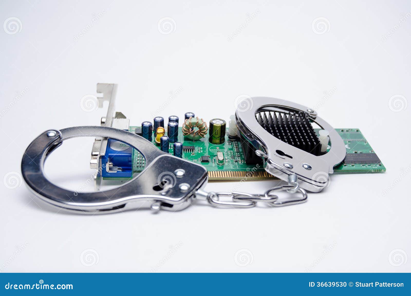 Handcuffs and Circuit Board Stock Photo - Image of crime, handcuff ...