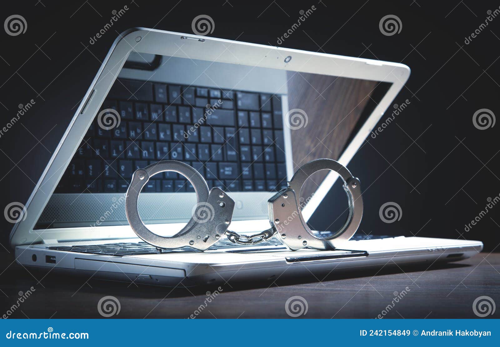 Handcuffs on the Computer Keyboard. Cyber Crime Stock Image - Image of ...