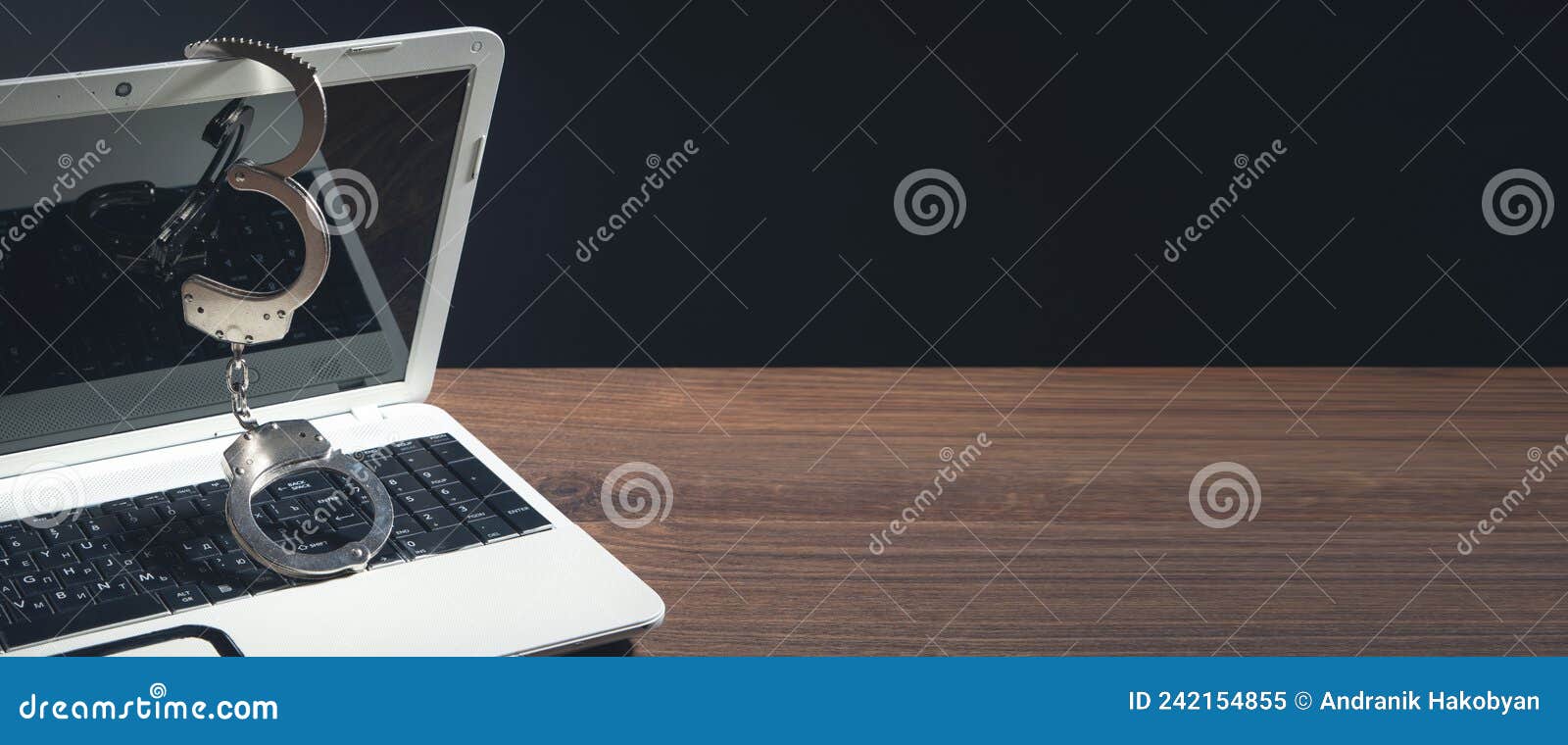 Handcuffs on the Computer Keyboard. Cyber Crime Stock Image - Image of ...