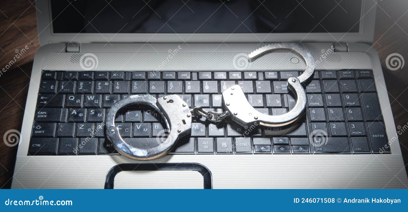 Handcuffs on the Computer Keyboard. Cyber Crime Stock Photo - Image of ...