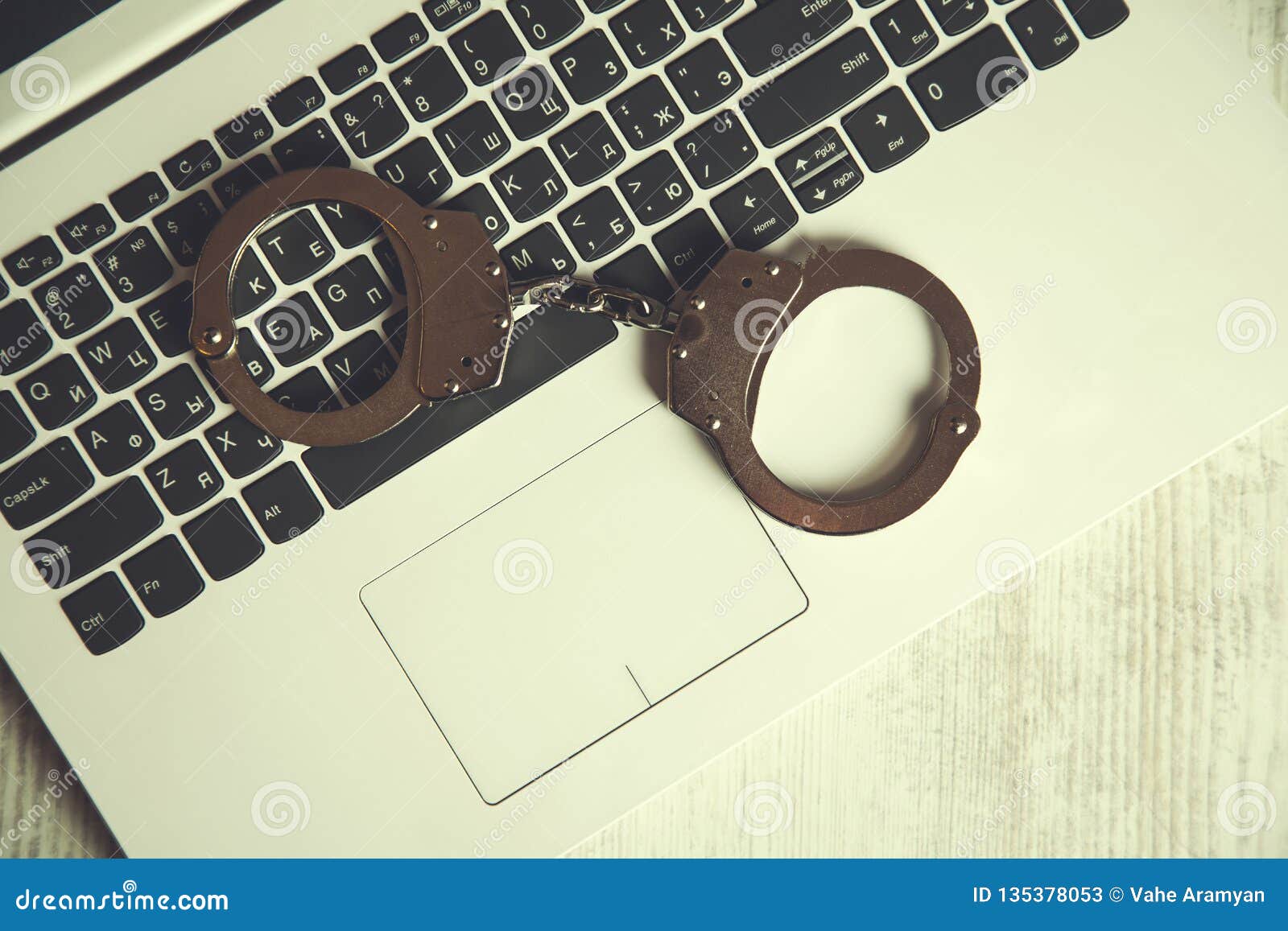 Handcuffs on keyboard stock image. Image of technology - 135378053
