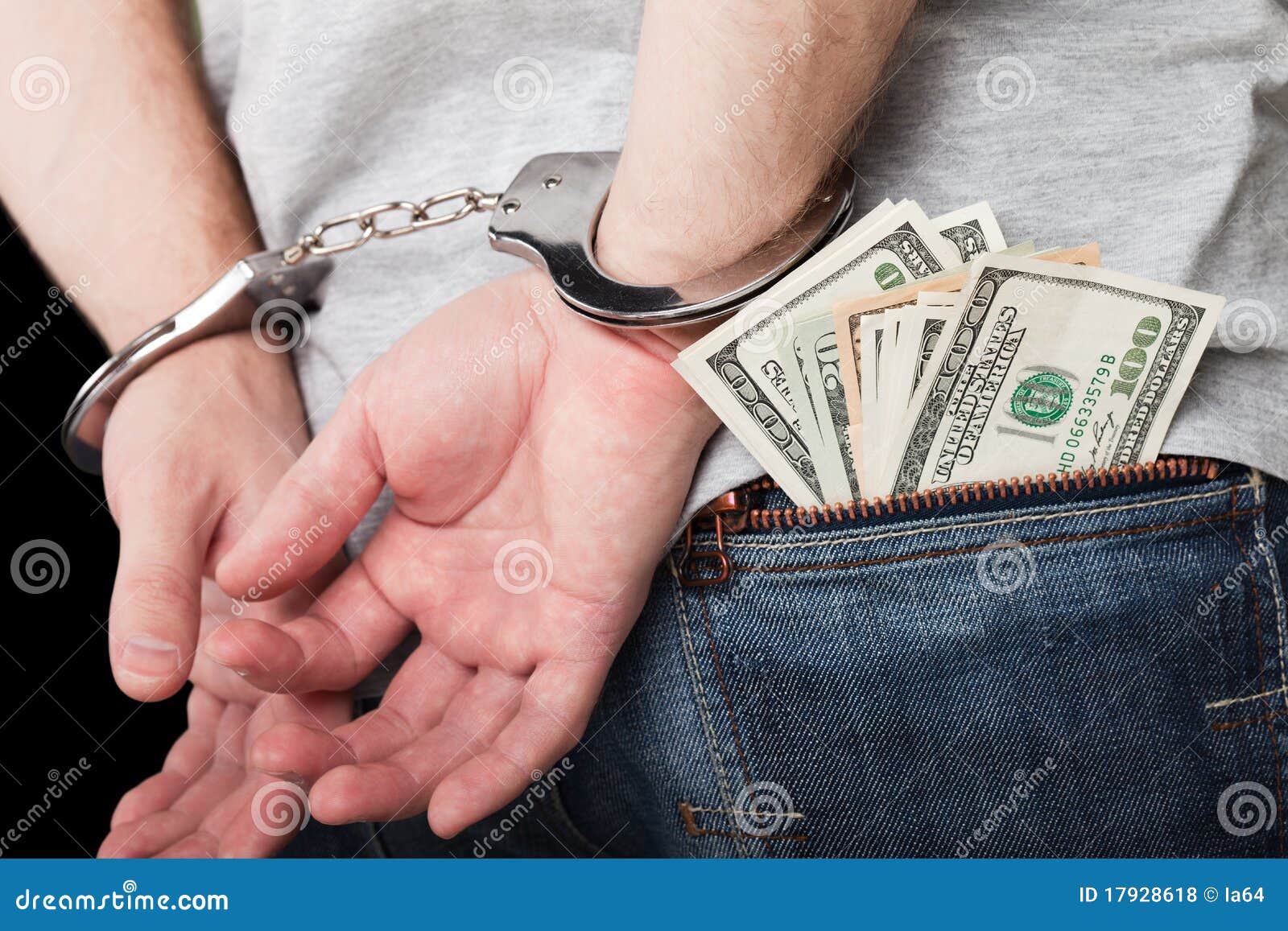 Handcuffs on Hands Hiding Money Stock Photo - Image of dollar, currency ...