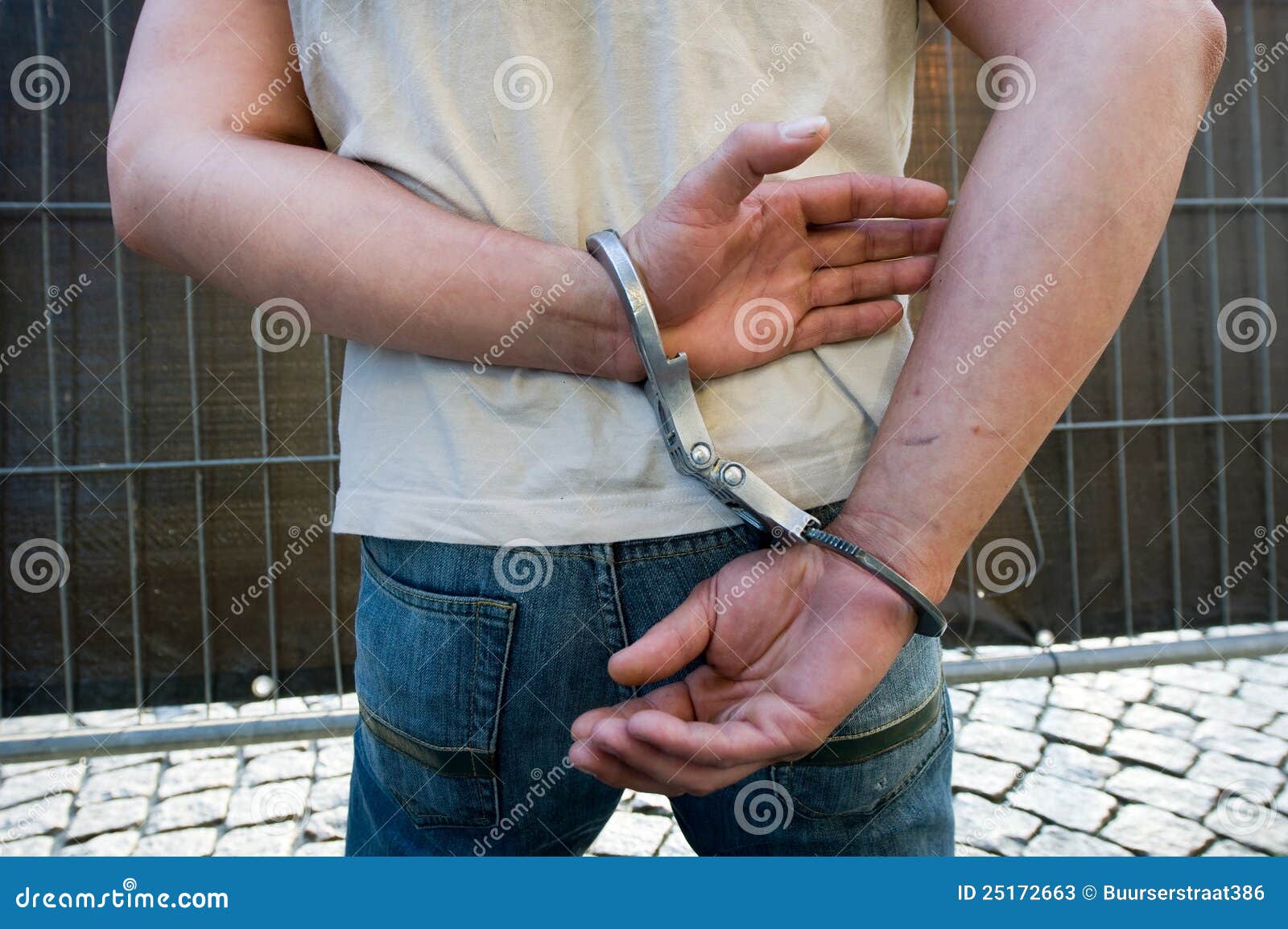 Handcuffs on his back stock image. Image of arrested - 25172663