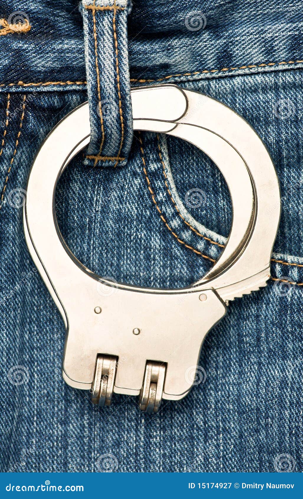Handcuffs on jeans stock image. Image of darbies, lock - 15174927