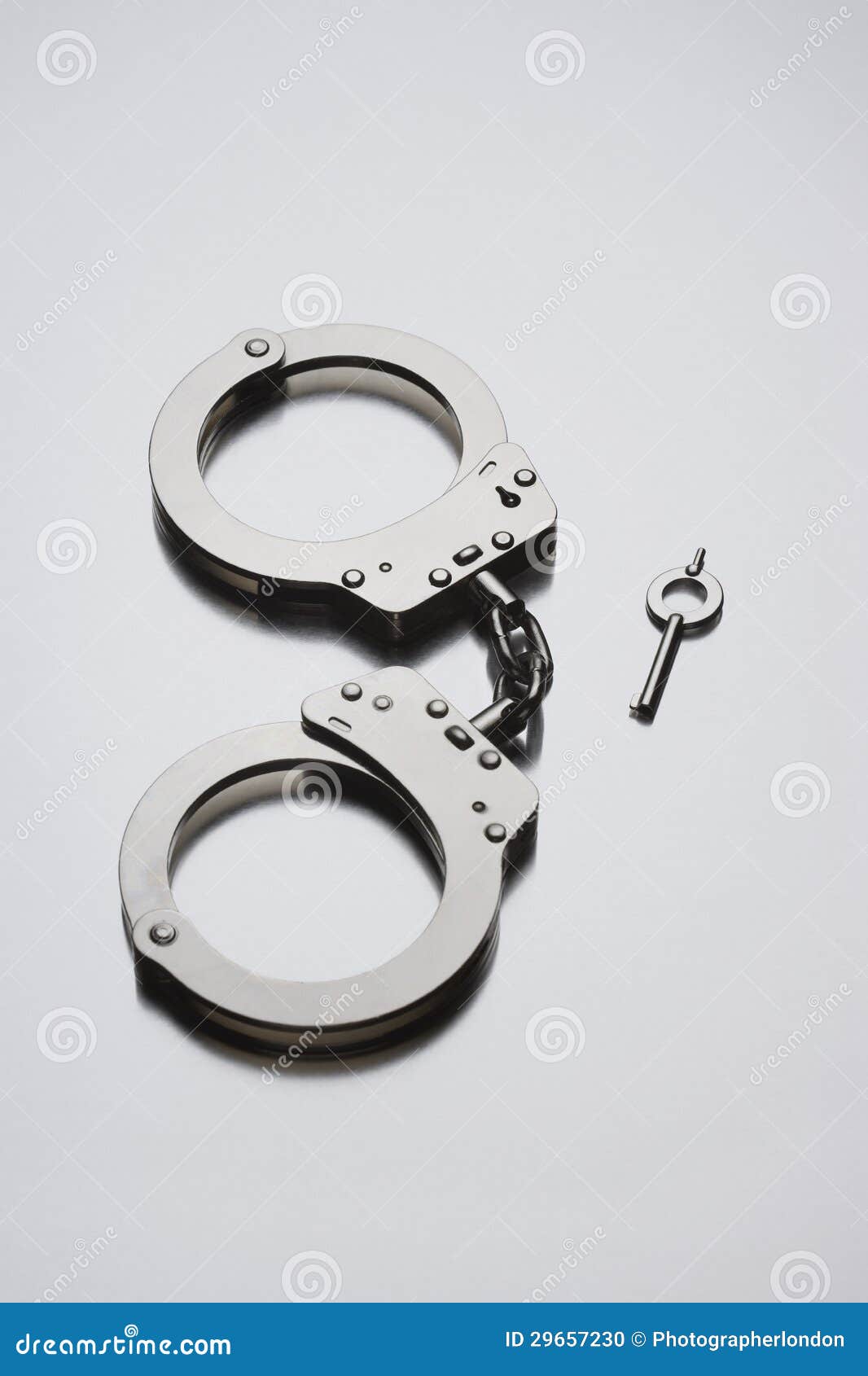 Handcuffs and Key stock photo. Image of control, isolated - 29657230