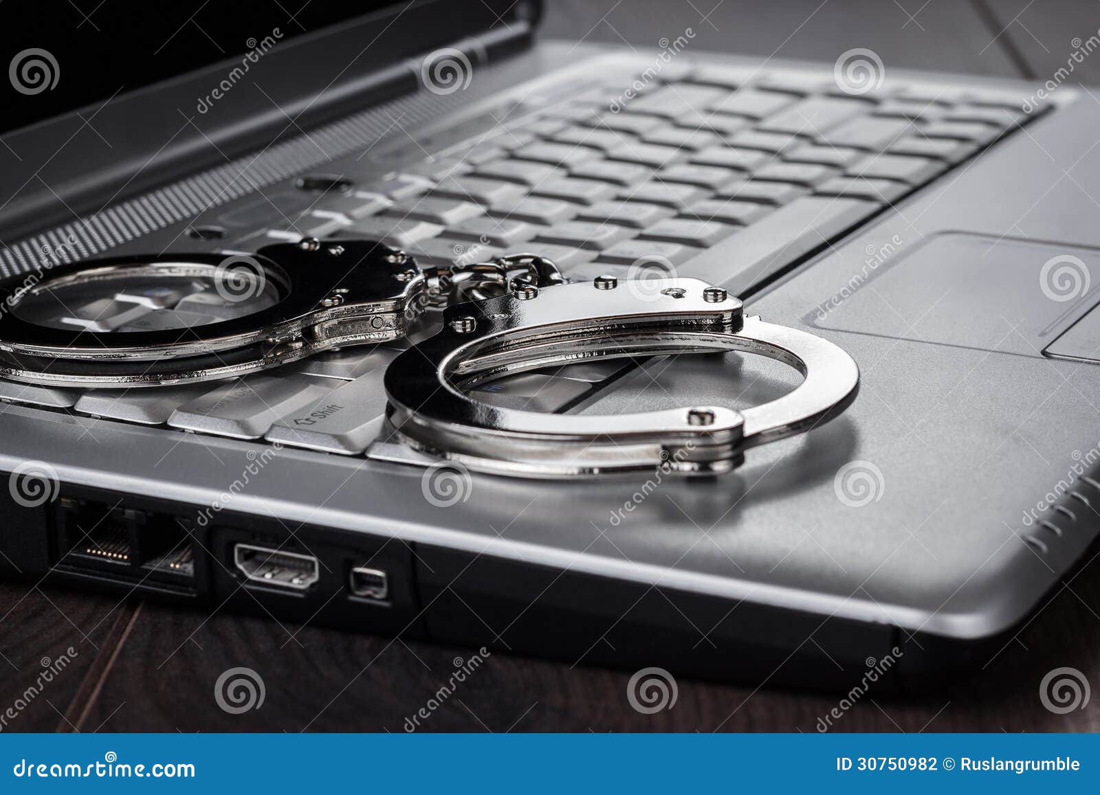 Handcuffs on Laptop Cyber Crime Concept Stock Photo - Image of fraud ...