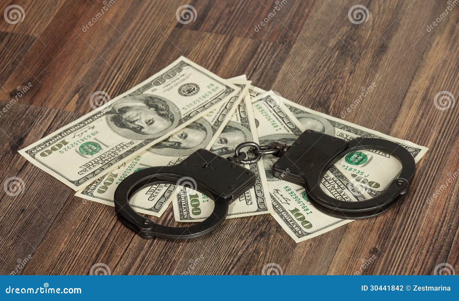 Handcuffs and money stock photo. Image of criminal, money - 30441842