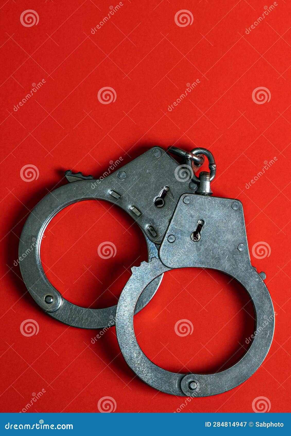 Handcuffs on the Paper stock image. Image of clipping - 284814947