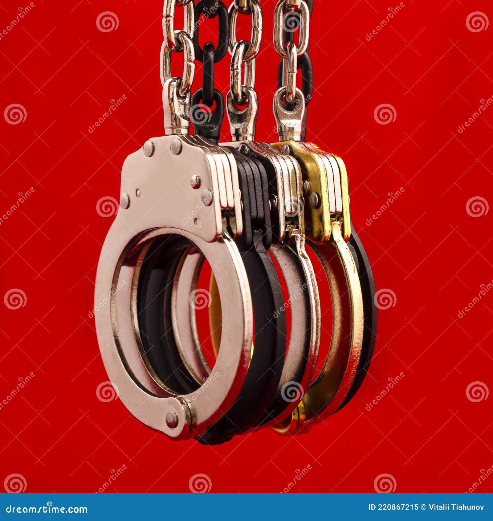 Handcuffs on a Red Background Stock Image - Image of fashionable ...