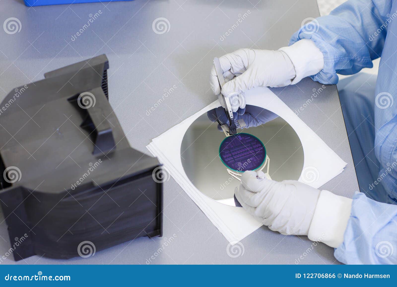 Handeling of a Wafer and Loading it in a Wafer Cassette Stock Photo ...