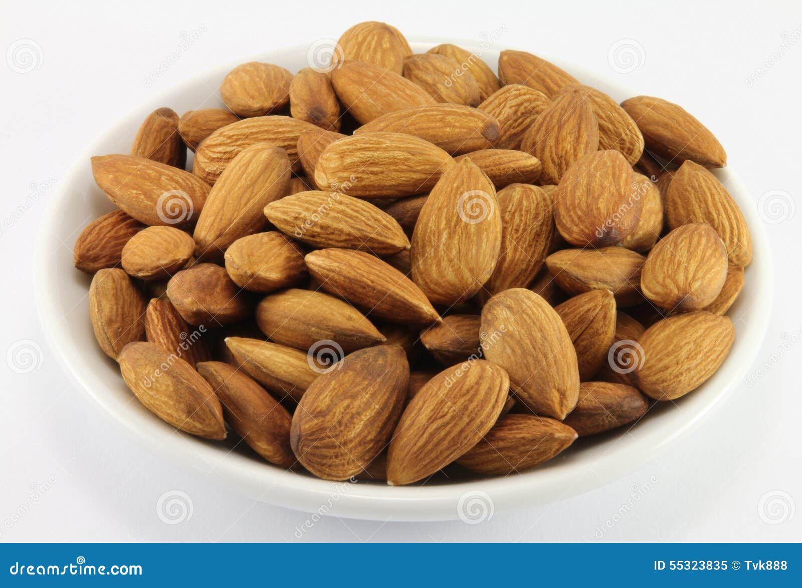 Handful of Almonds on a White Porcelain Dish Stock Image - Image of ...