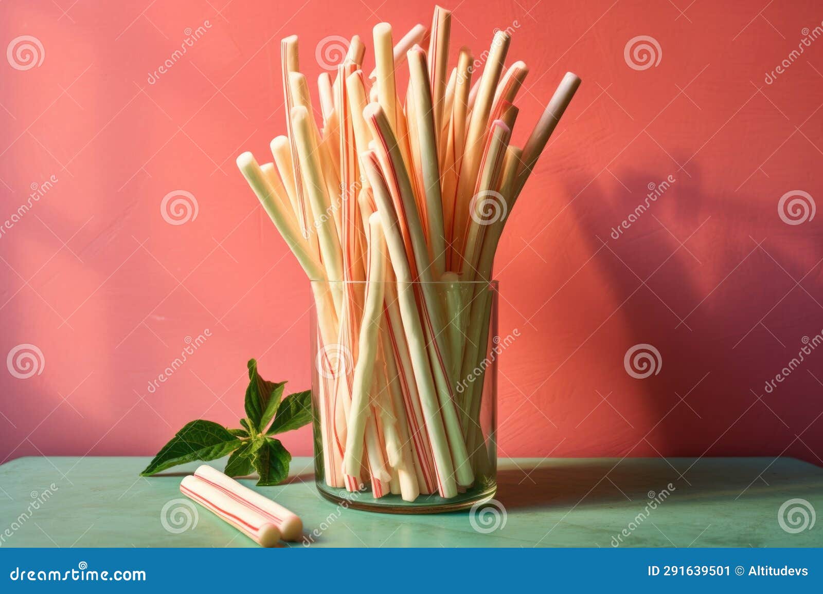 A Handful of Candy Canes on a Pastel-colored Table Stock Image - Image ...