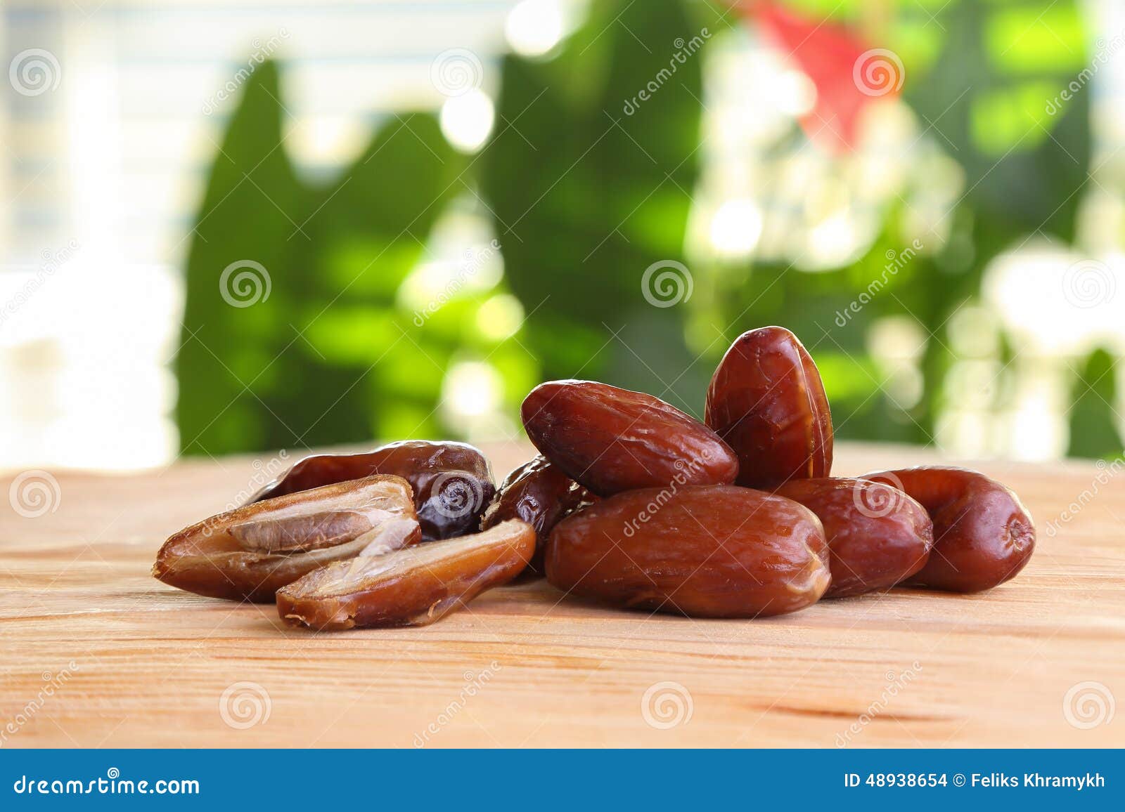 A Handful of Dates on the Wooden Table Stock Photo - Image of nature ...