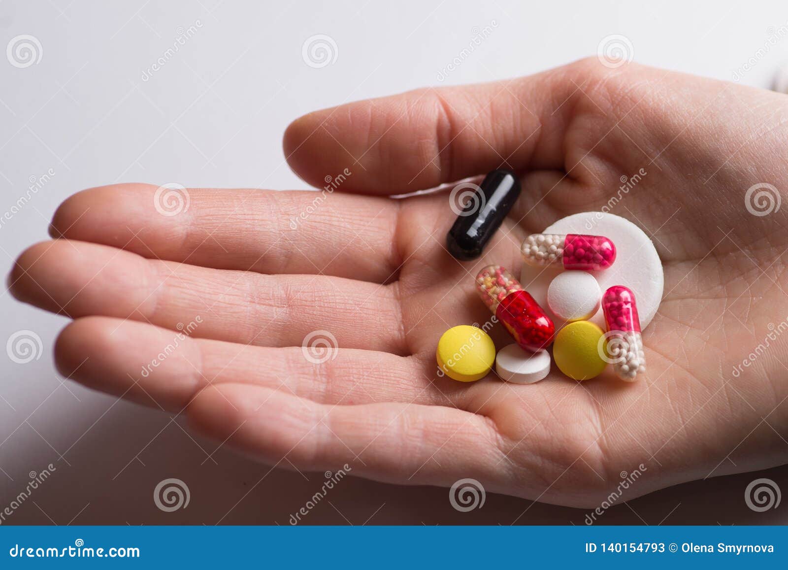 Handful of different pills stock image. Image of female - 140154793