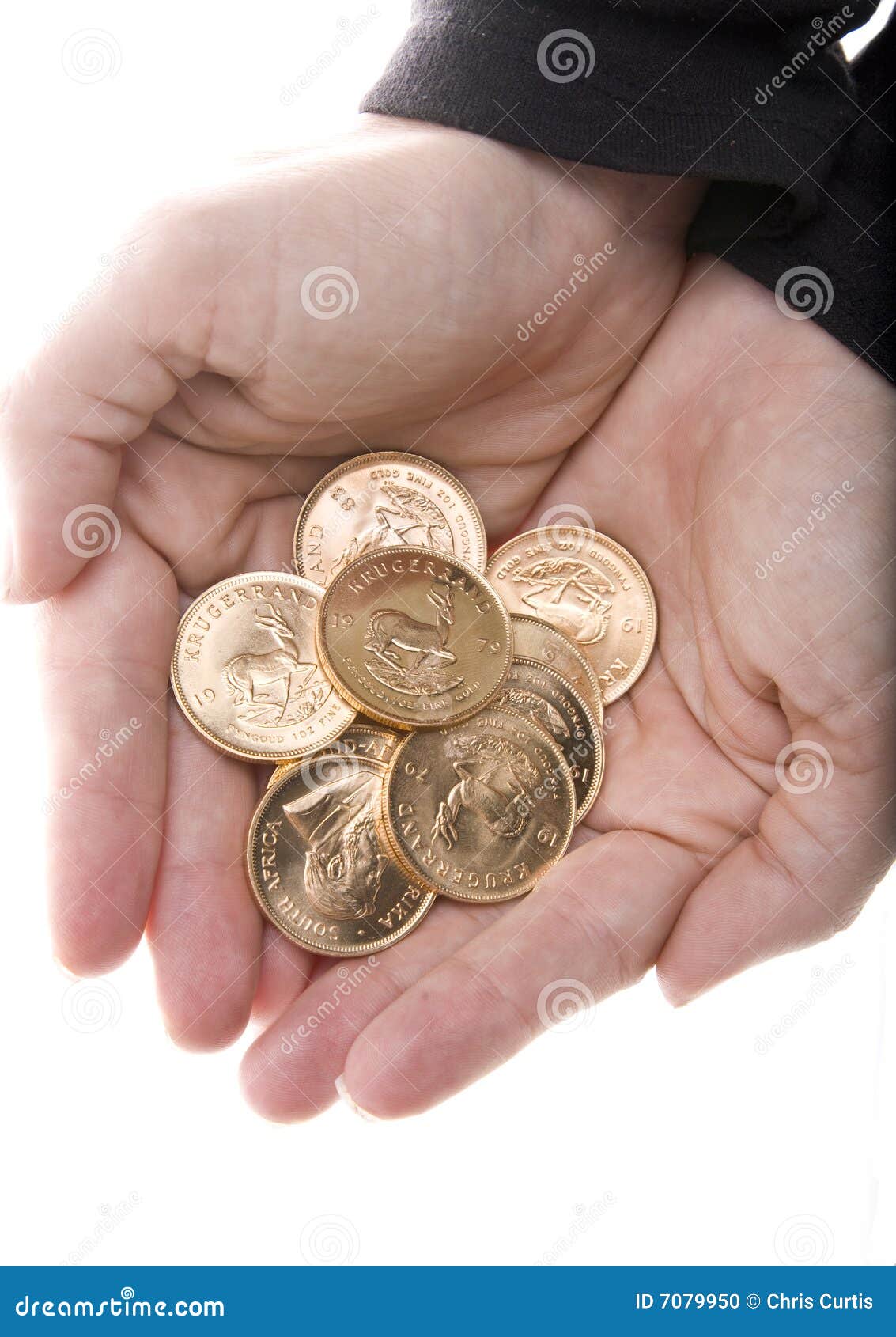 Handful of Gold Kruggerand Coins Stock Photo - Image of palm, fingers ...