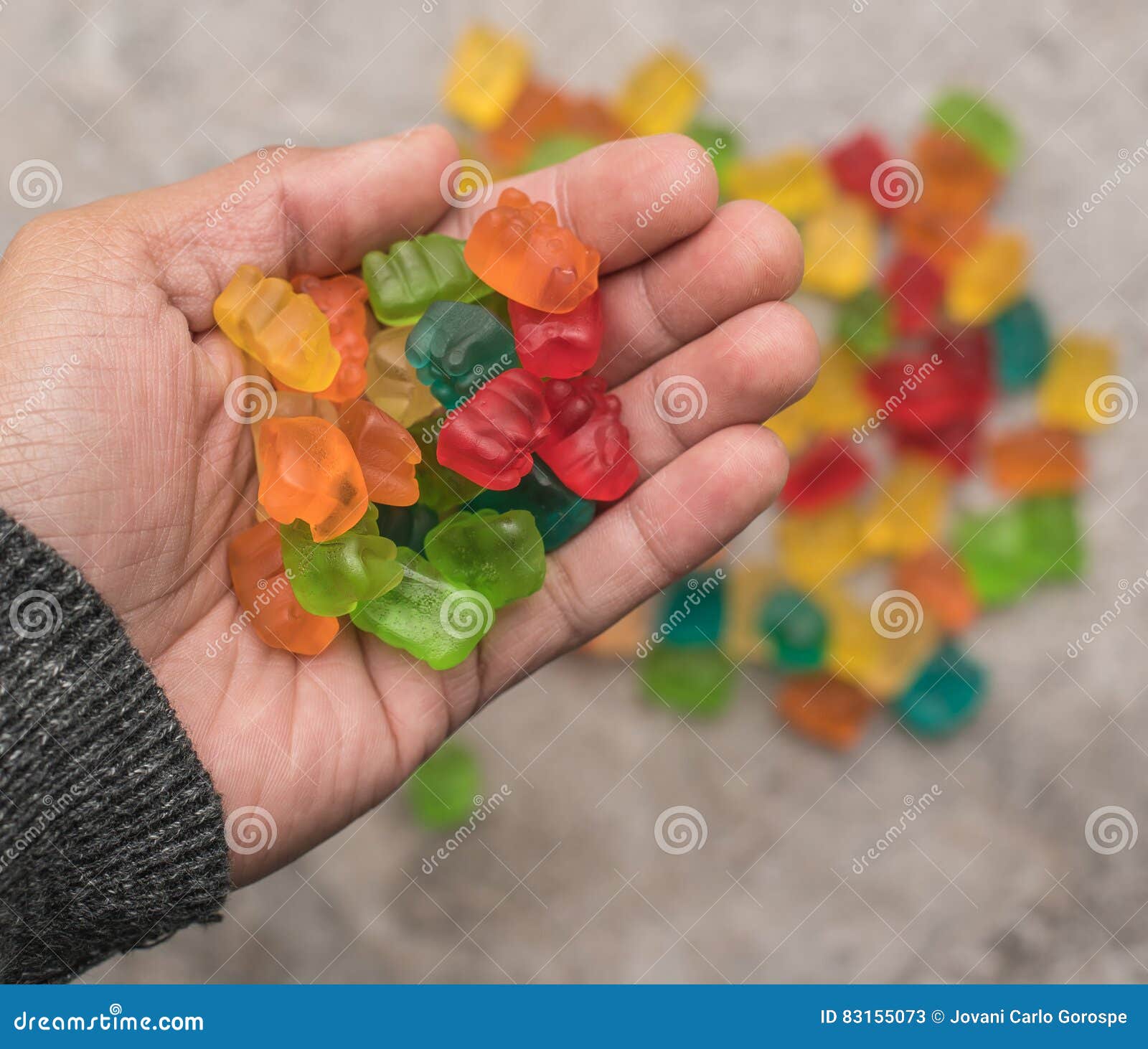 Handful of Gummy Bears editorial stock photo. Image of handful - 83155073