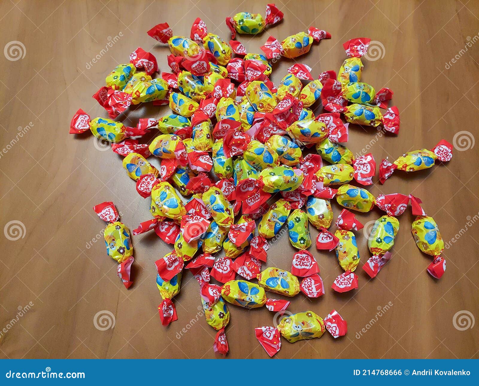 A Handful of Jelly Candies in Bright Wrappers on the Table Editorial ...