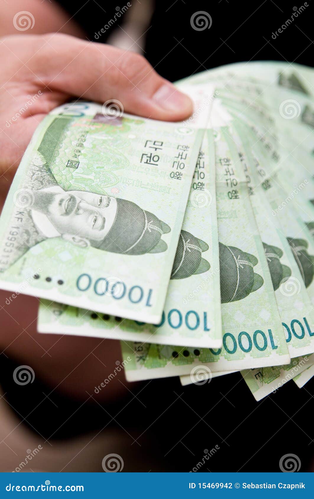 Handful of Korean Won stock photo. Image of wons, finance - 15469942