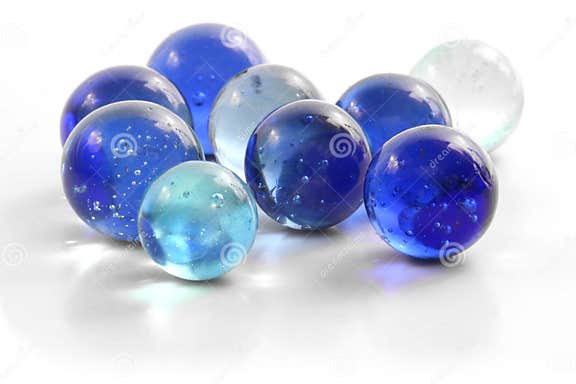 Handful of Marbles stock photo. Image of light, transparent - 4321518