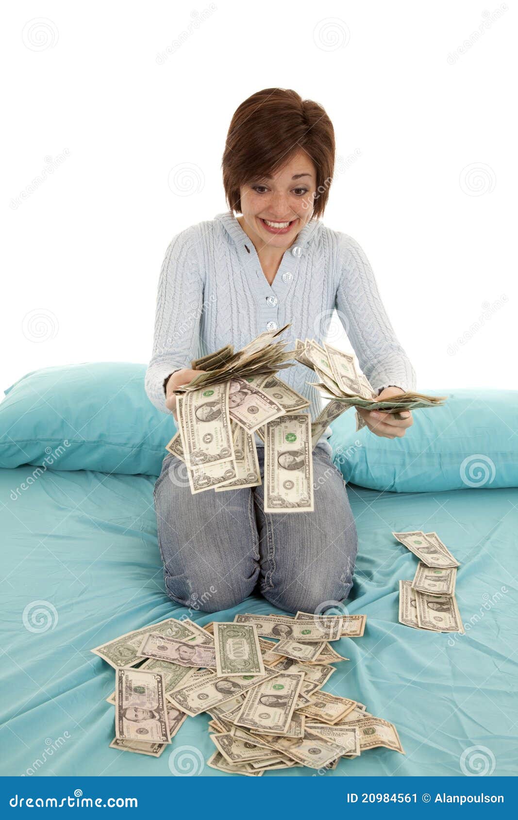 Handful of money bed stock image. Image of financial - 20984561