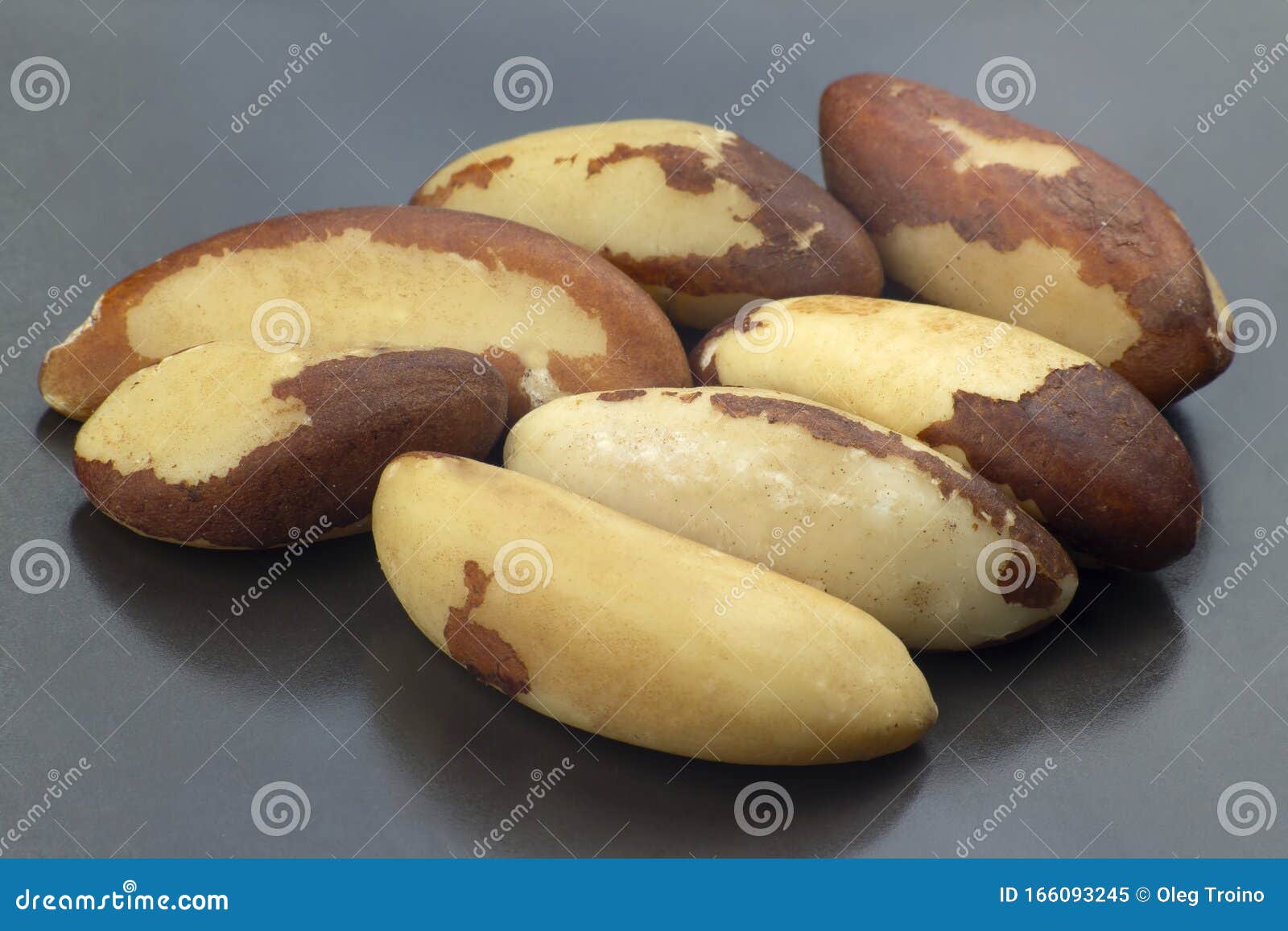 Handful of Nuts Close-up on a Dark Plate Stock Image - Image of energy ...