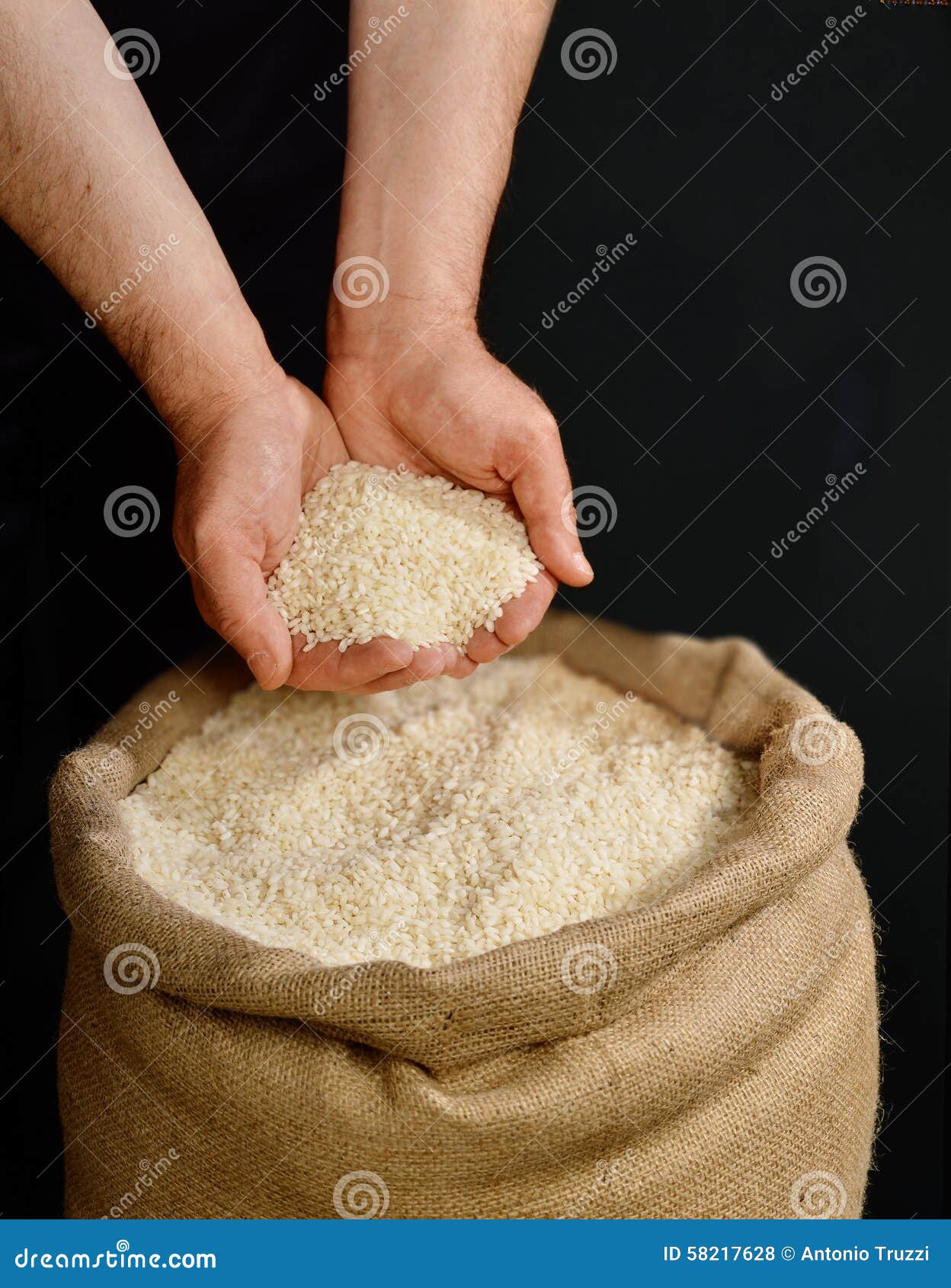 Handful of Rice stock photo. Image of seed, white, sack - 58217628