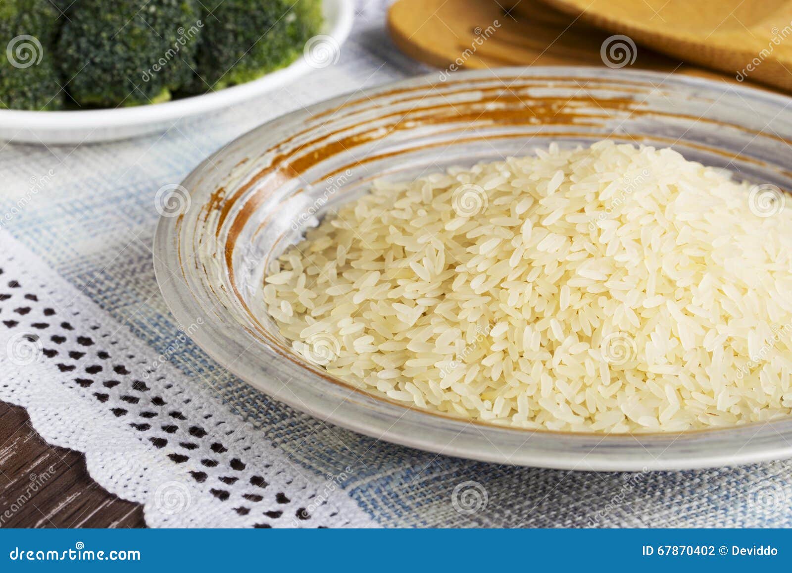 Handful of rice grains stock photo. Image of grains, spoon - 67870402