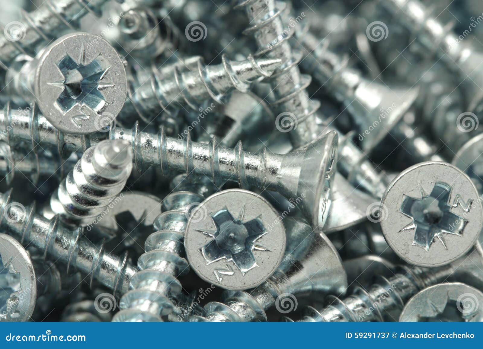 A Handful of Shiny Anodized Screws Stock Image - Image of steel ...