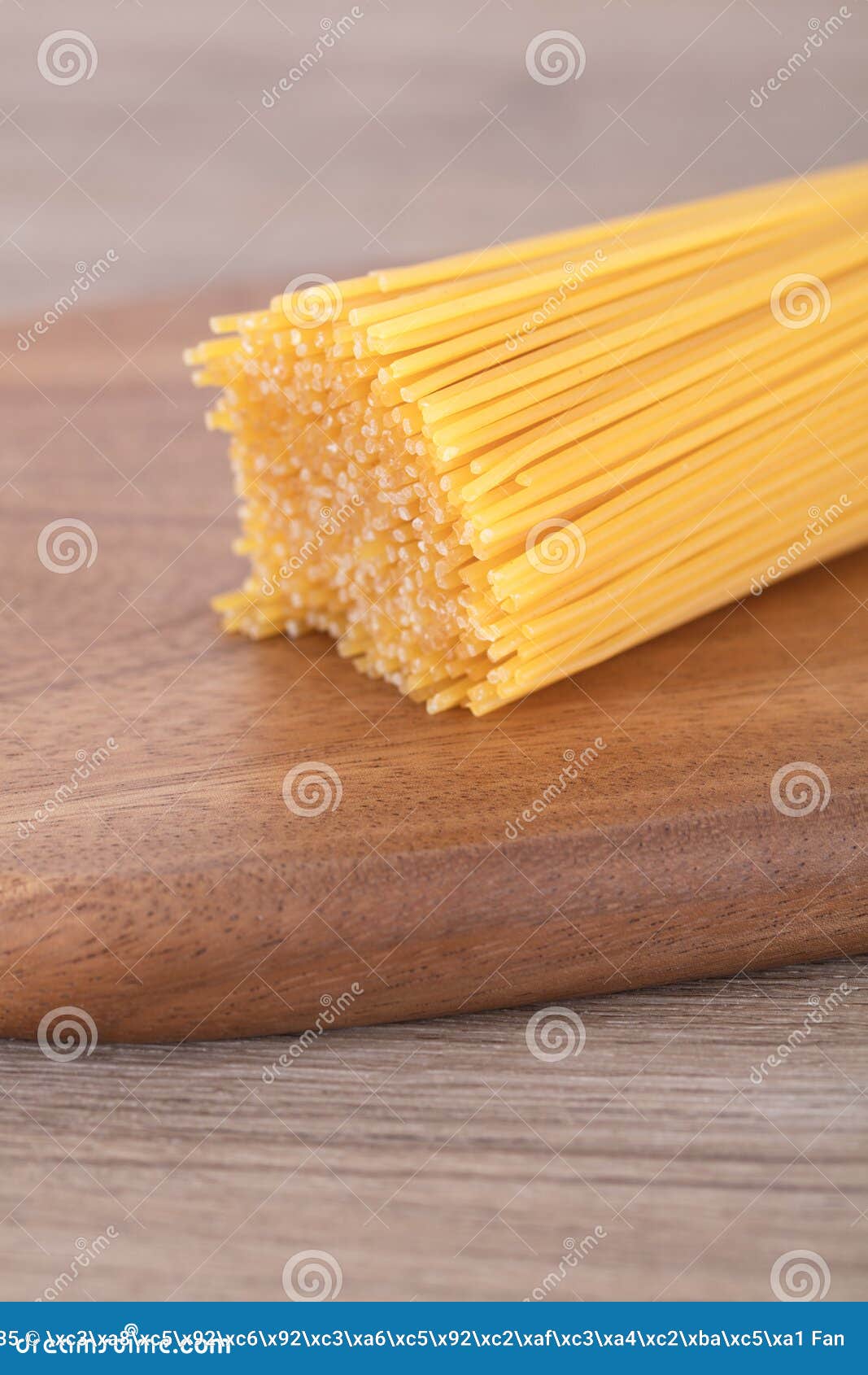 A Handful of Spaghetti on a Cutting Board Stock Image - Image of pasta ...